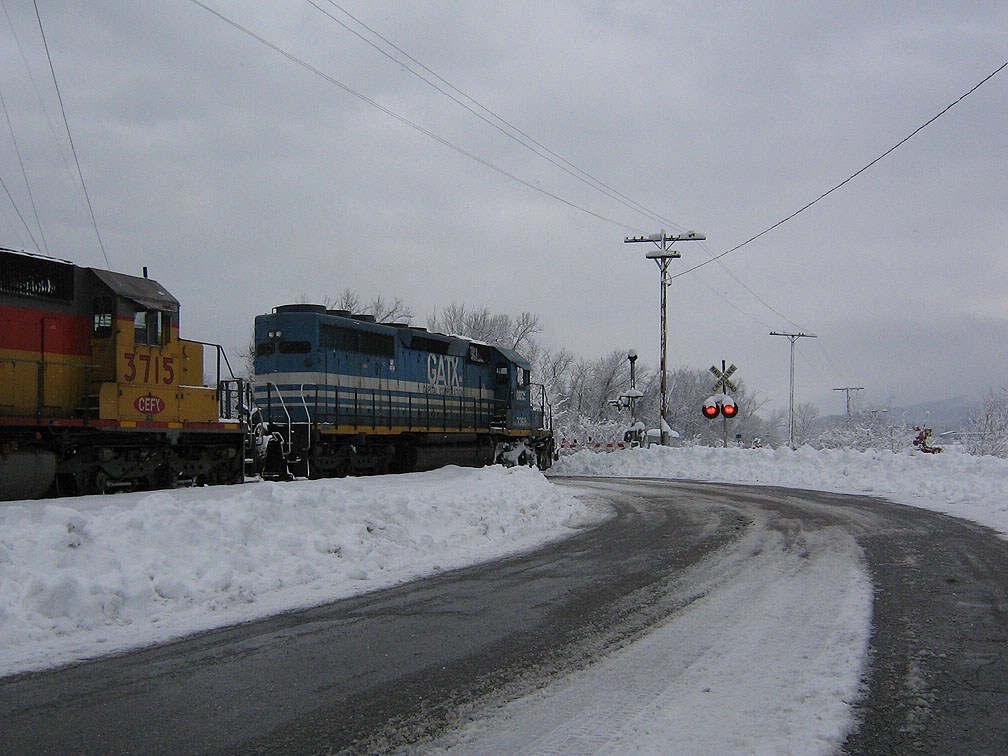 GSCX 7369 in crossing with southbound leaving yard